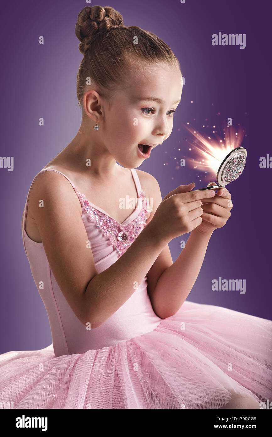 Ballerina children looking in the magic mirror Stock Photo - Alamy