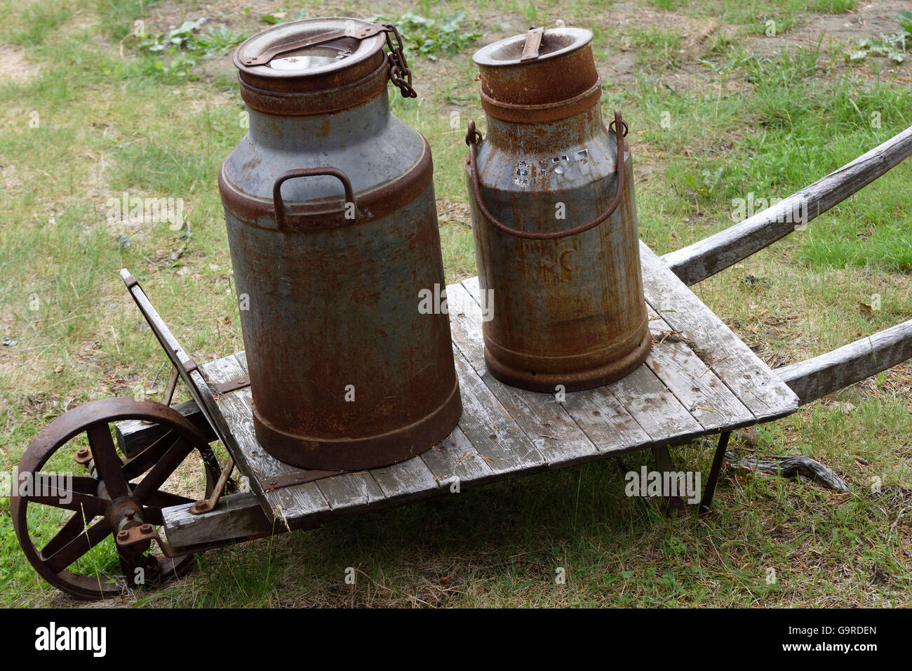 Two old milk buckets on a old wheelbarrow, picture from the North of ...
