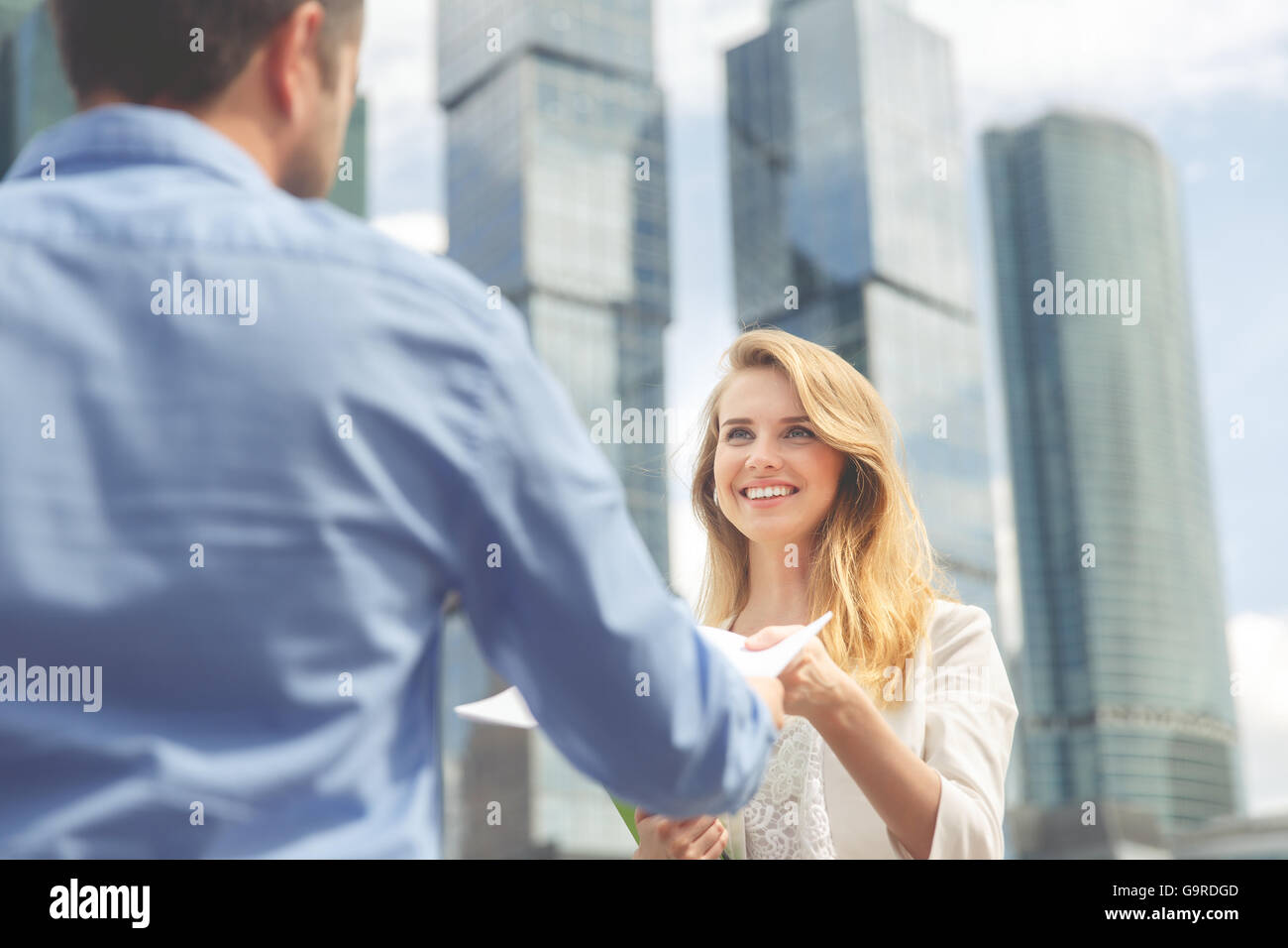 Handing over documents hi-res stock photography and images - Alamy