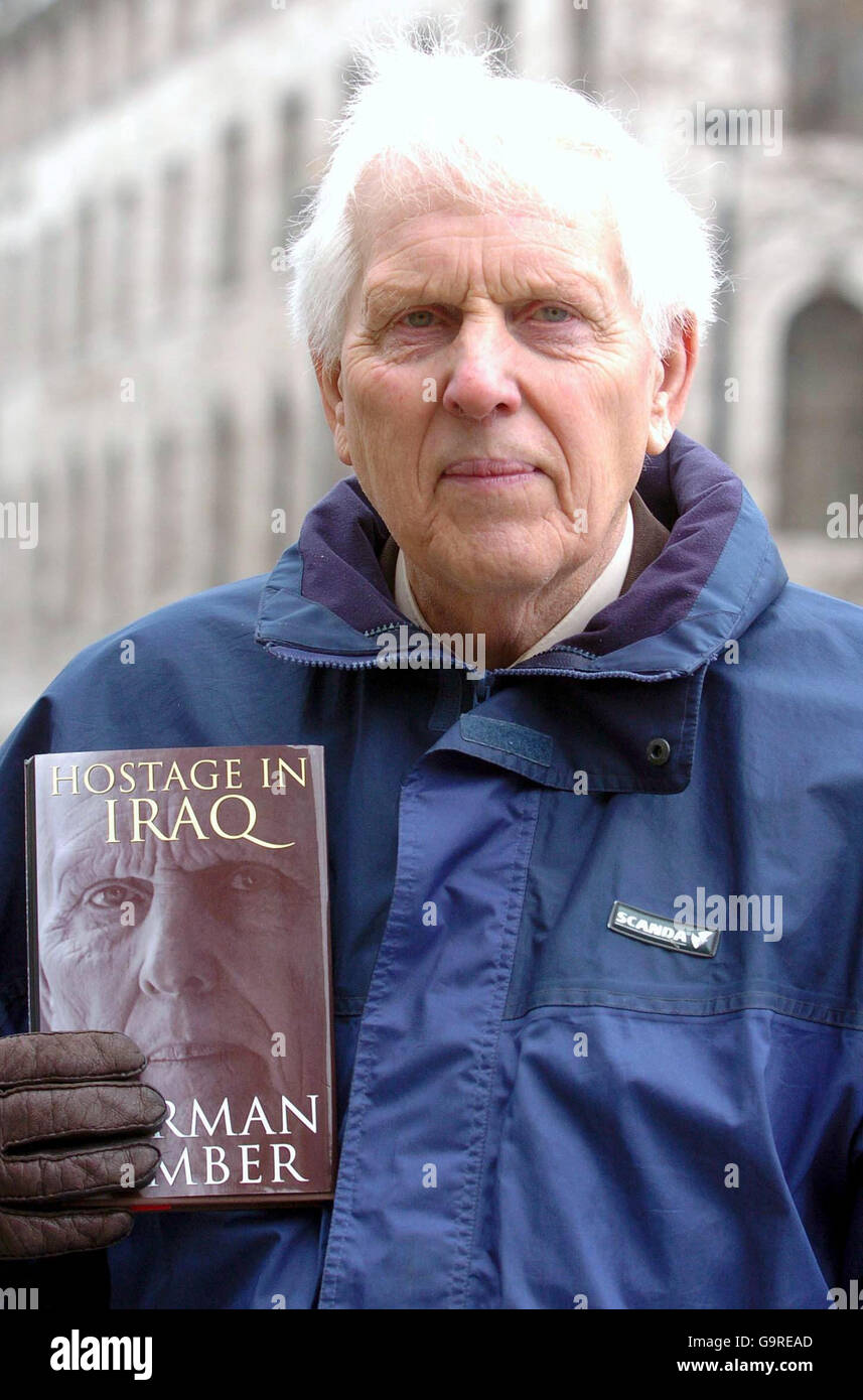 Former Iraqi hostage Norman Kember, shows his new book Hostage in Iraq ...