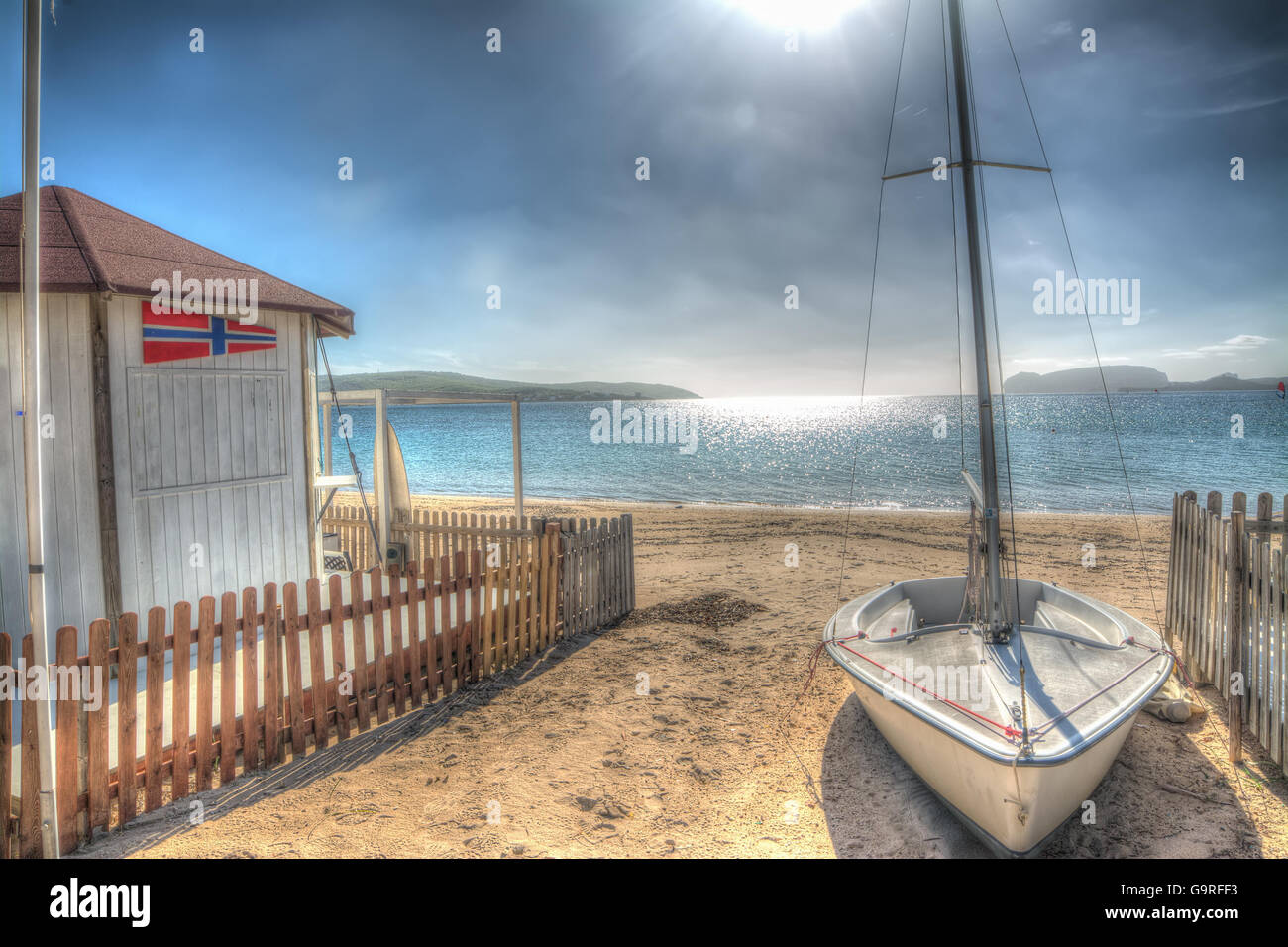 Mugoni beach shoreline under a cloudy sky Stock Photo - Alamy