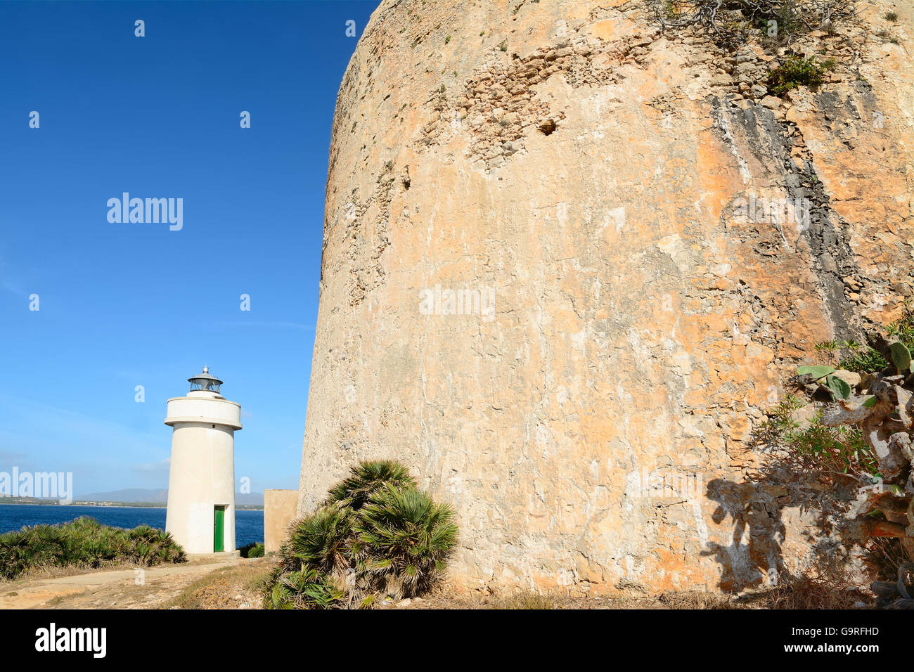 defensive tower and lighthouse in Porto Conte, Sardinia Stock Photo - Alamy