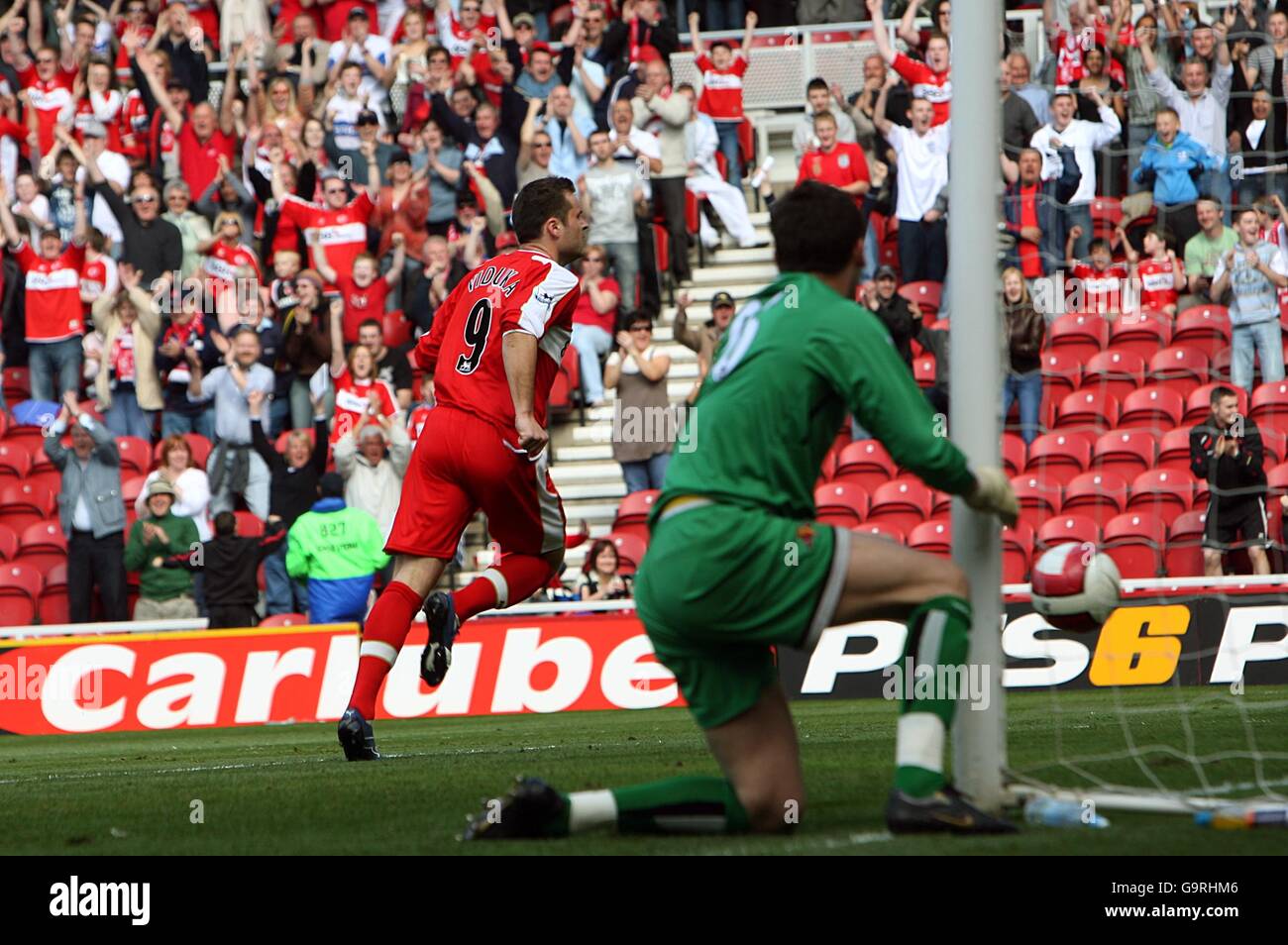 Middlesbrough's Mark Viduka (left) turns away to celebrate scoring the ...