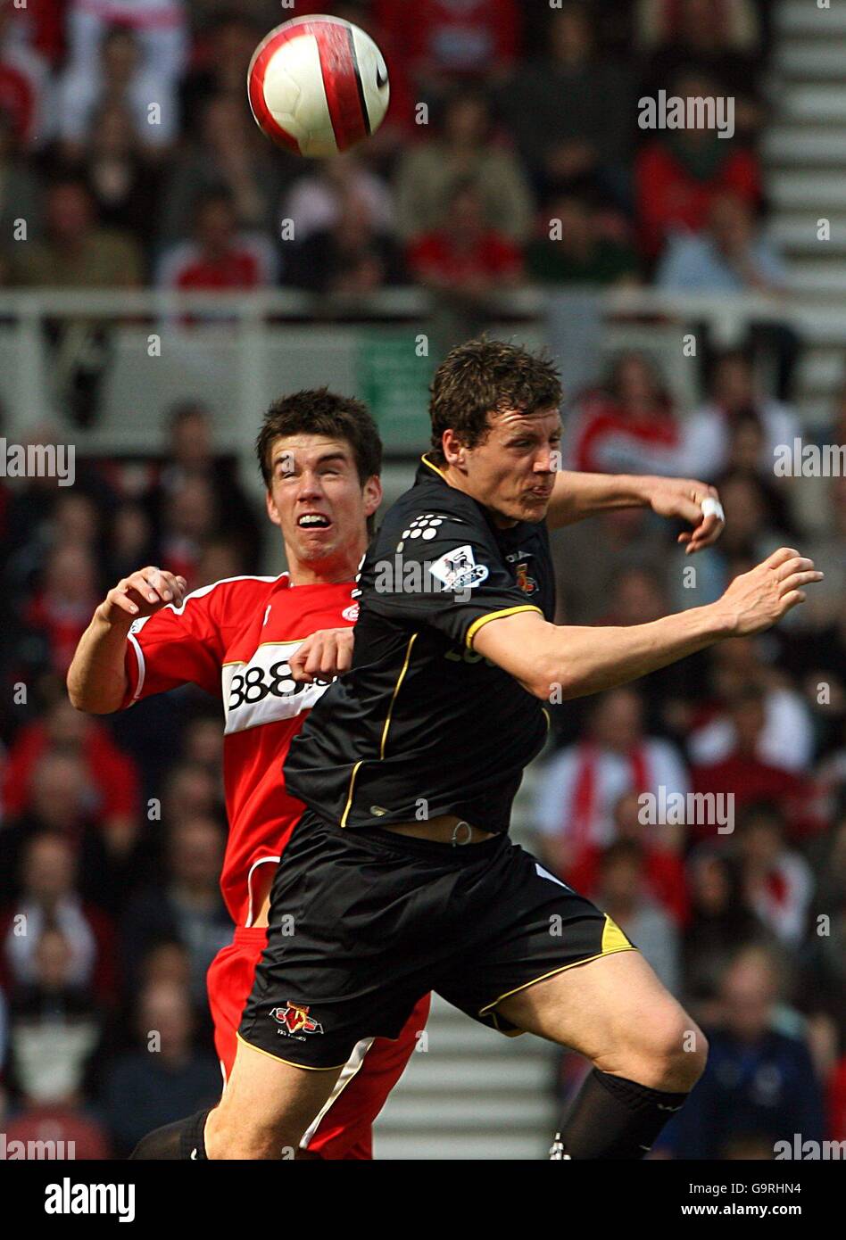 Middlesbrough's Chris Riggott (left) and Watford's Darius Henderson ...