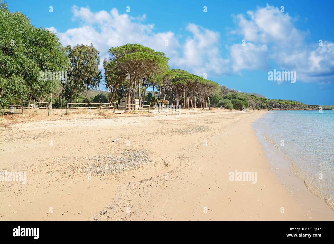 Mugoni beach shoreline under a cloudy sky Stock Photo - Alamy