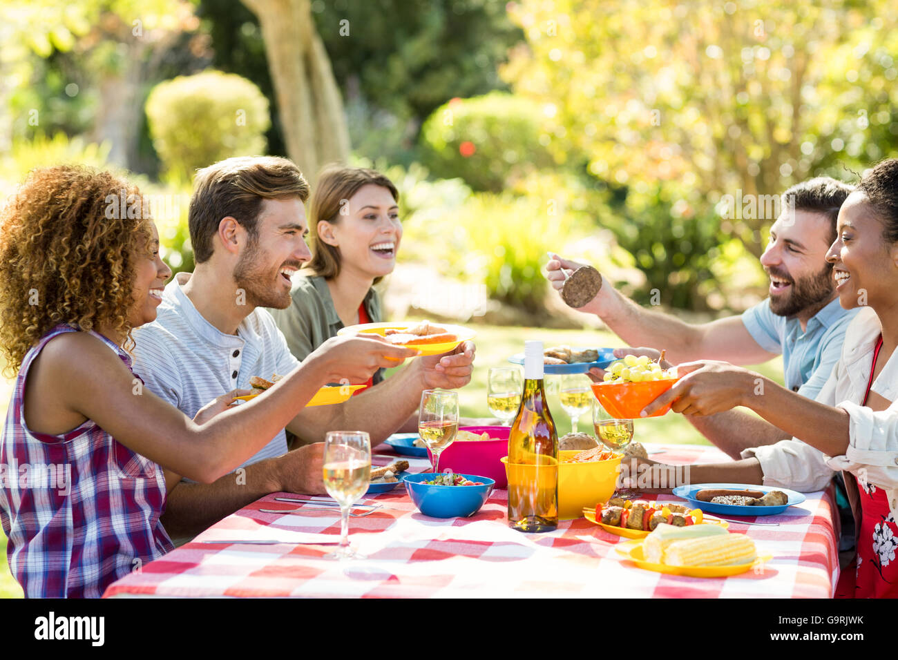 Friends having breakfast together Stock Photo - Alamy