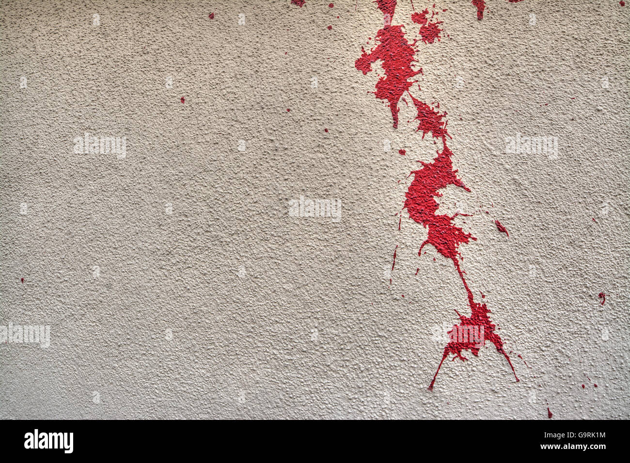 red stains on a rustic wall. Processed for hdr tone mapping effect ...