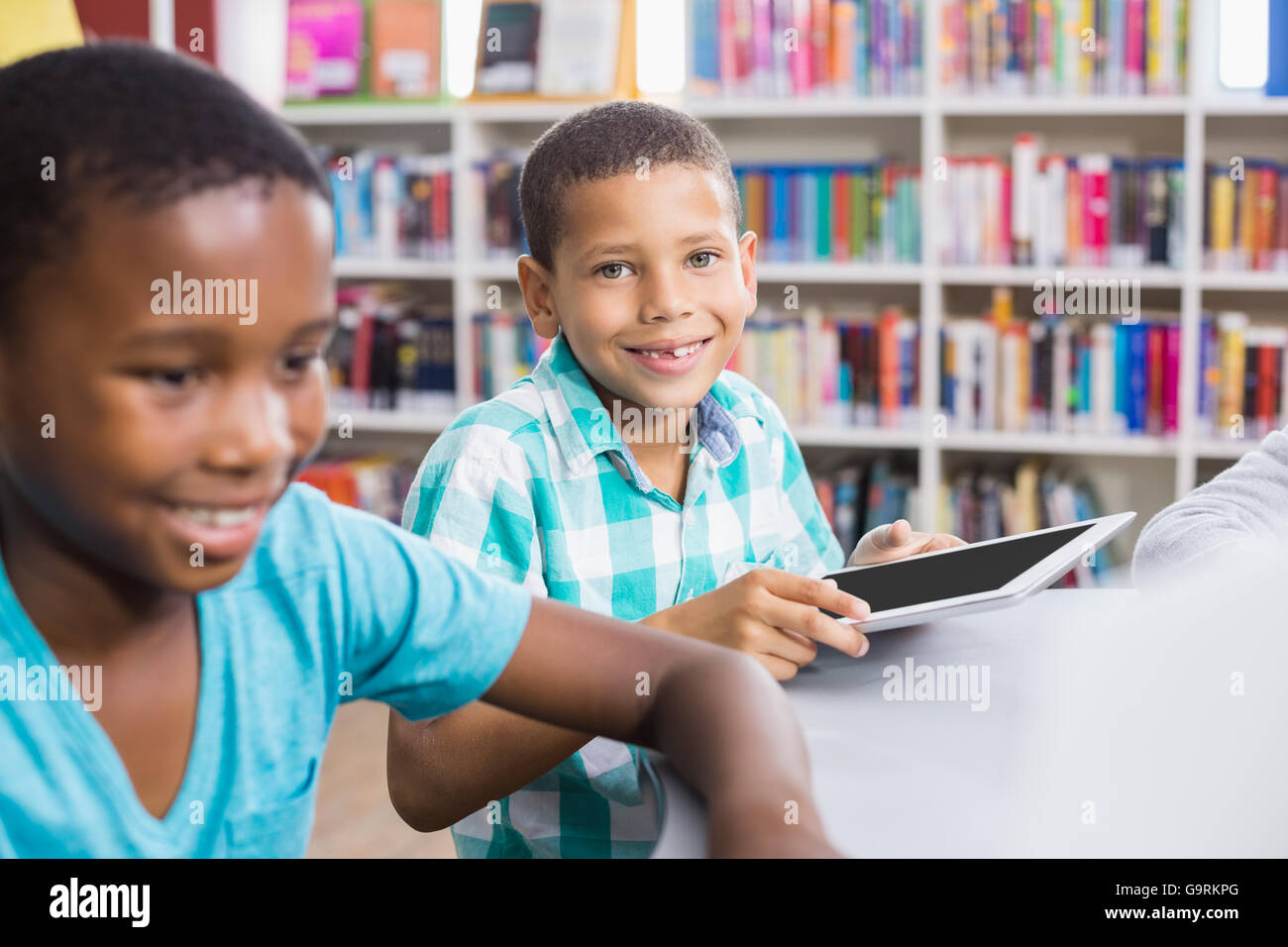 Kids studying tablet hi-res stock photography and images - Alamy