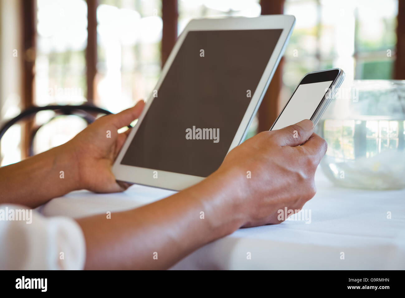 Woman using technology hi-res stock photography and images - Alamy