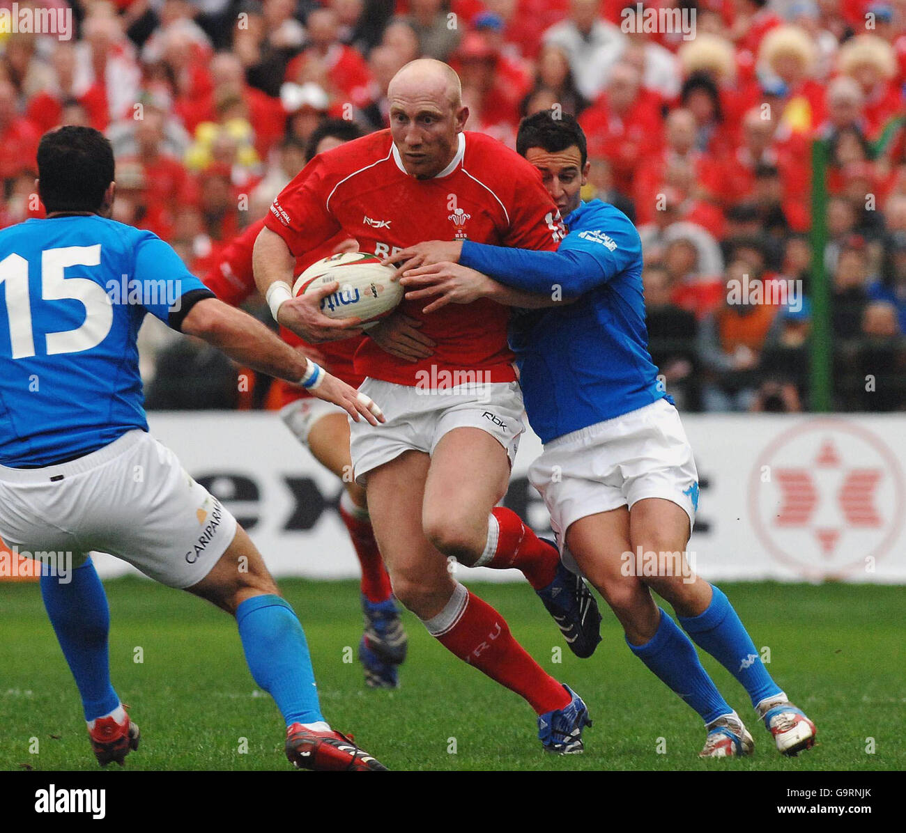 Wales's Tom Shanklin (centre) gathers a kick ahead to set up his team's ...