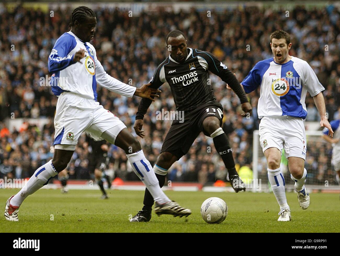 Blackburn Rovers' Christopher Samba (left) and Manchester City's Darius ...