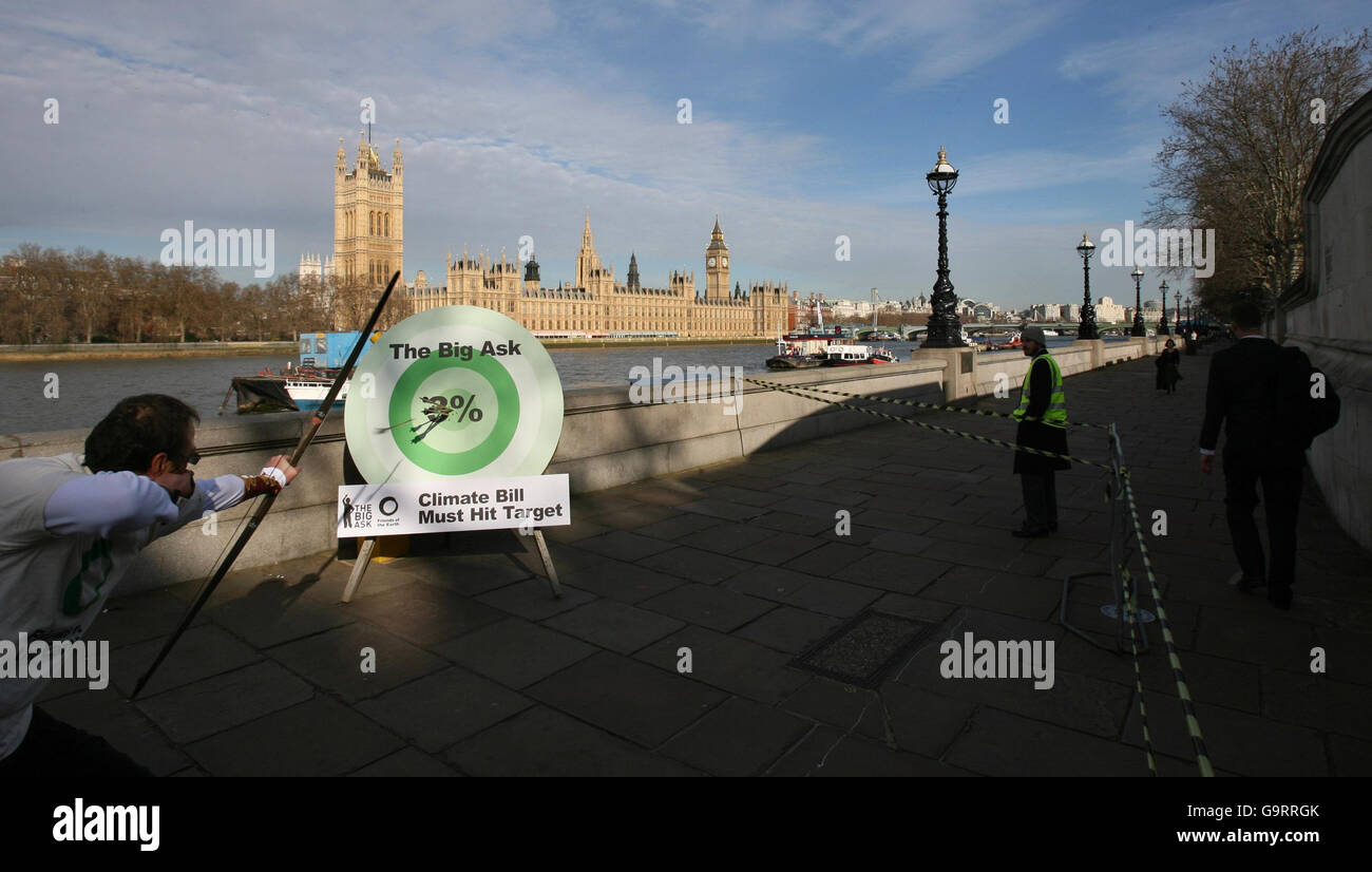 Archer Steve Nicholson fires an arrow at a board with the bullseye ...