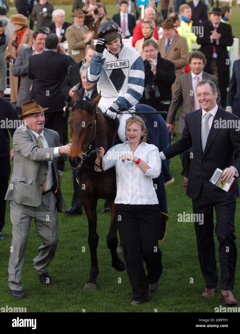 Gaspara and jockey Andrew Glassonbury celebrate with owner Martin Pipe ...