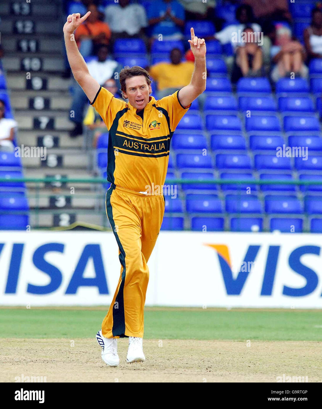 Australia's Glenn McGrath celebrates after taking the wicket of ...