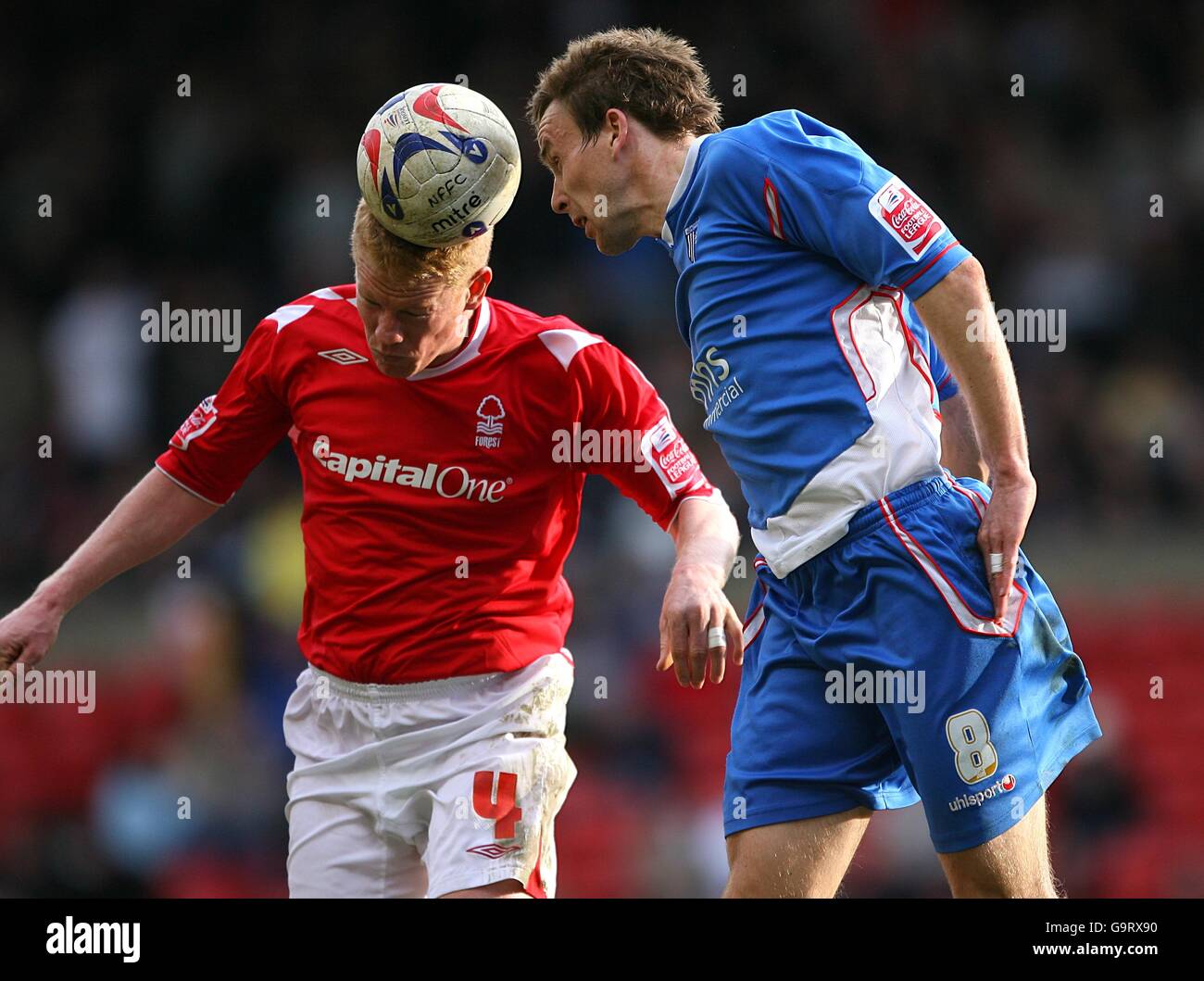 Gillingham's Mark Bentley and Nottingham Forest's Gary Holt battle for ...