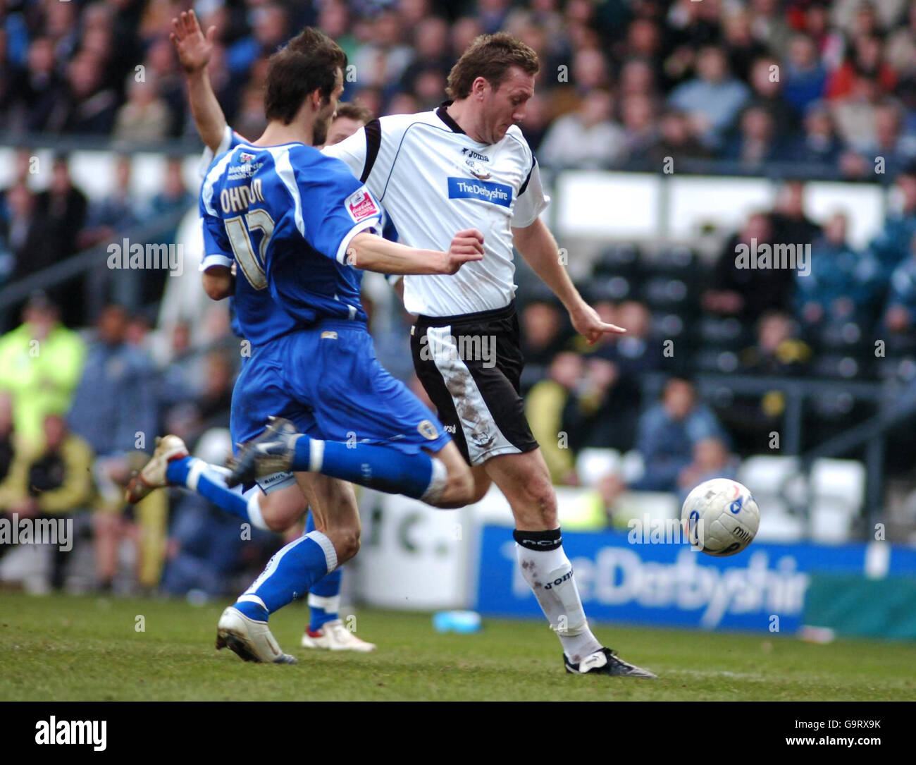 Derby County's Steve Howard (right) scores his second goal against ...