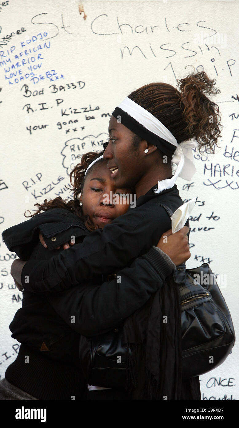 Family members of the murdered schoolboy Kodjo Yenga cry in front of a ...