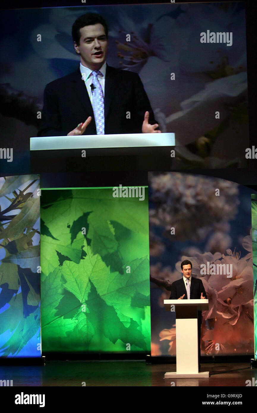 Shadow chancellor George Osborne speaks as his image is projected ...