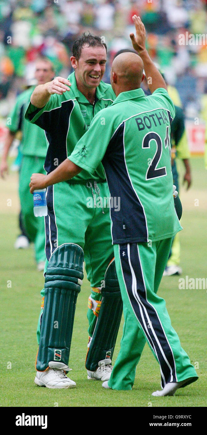 Ireland captain Trent Johnston celebrates with Andre Botha after ...