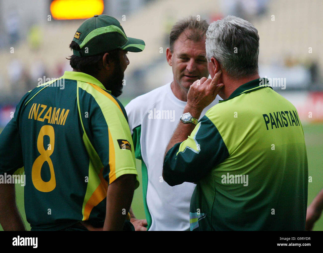 Pakistan coach Bob Woolmer (right) talking to Ireland coach Adrian ...