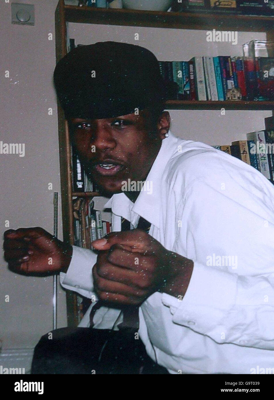 Collect picture of Adam Regis, which was held up by a police office at ...