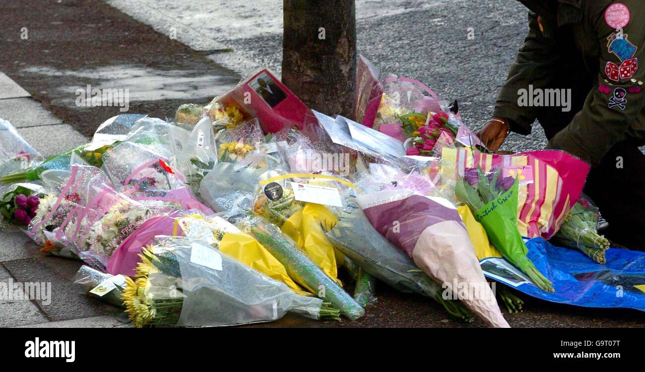 Floral tributes are left at the scene where Adam Regis was stabbed to ...