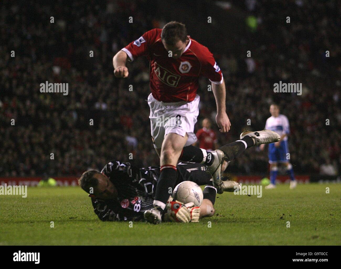 Middlesbrough's Mark Schwarzer makes a save at the feet of Manchester ...