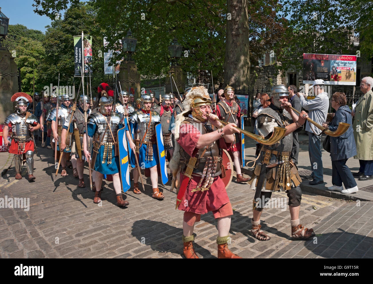Men in costume marching from the Museum Gardens at the Roman Festival ...