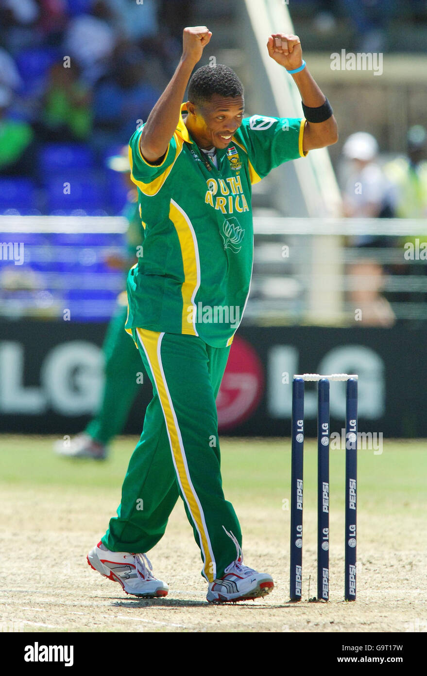 South Africa's Makhaya Ntini celebrates taking the wicket of Australia ...