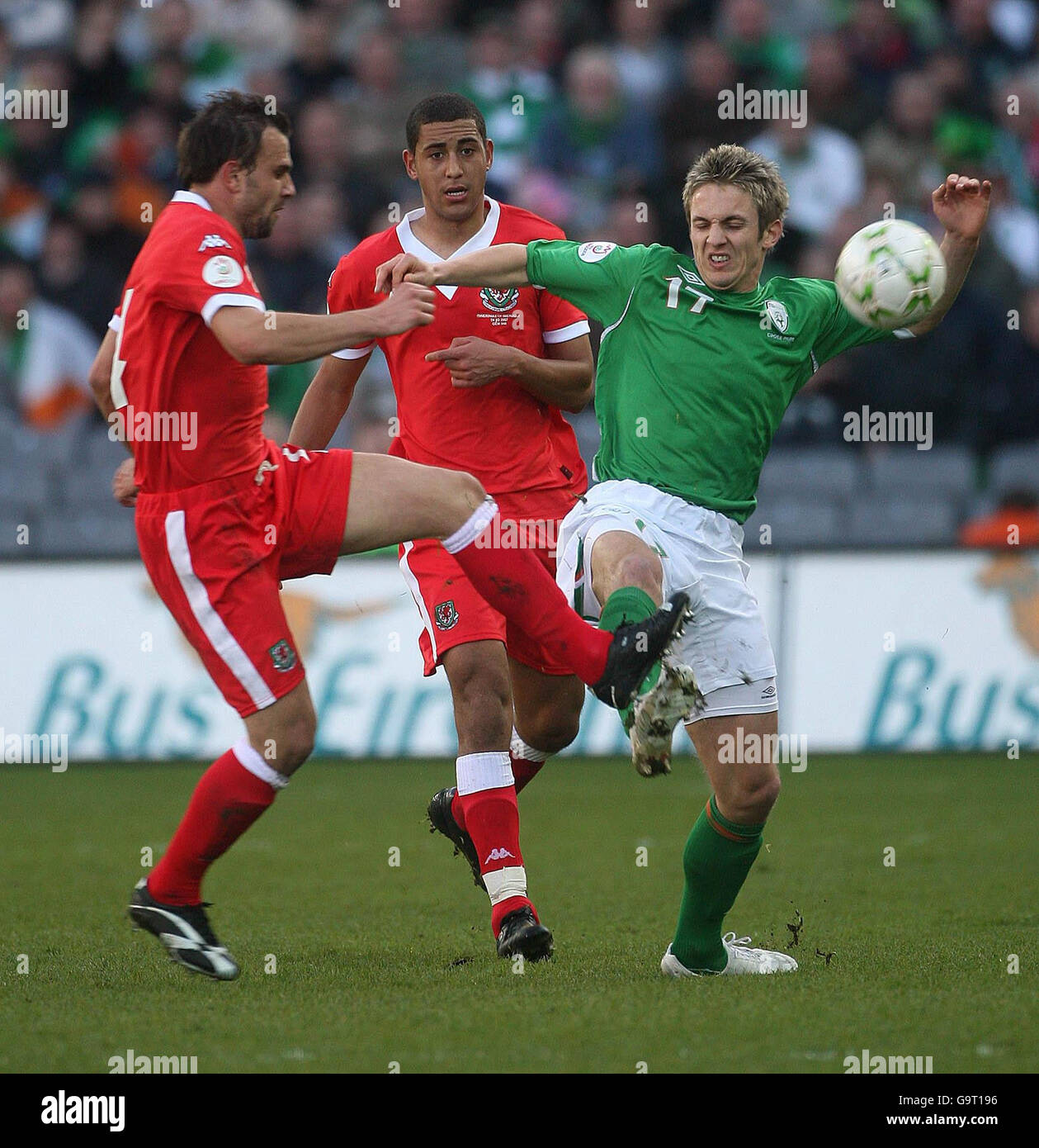 Republic of Ireland's Kevin Doyle (right) challenges Carl Fletcher of ...