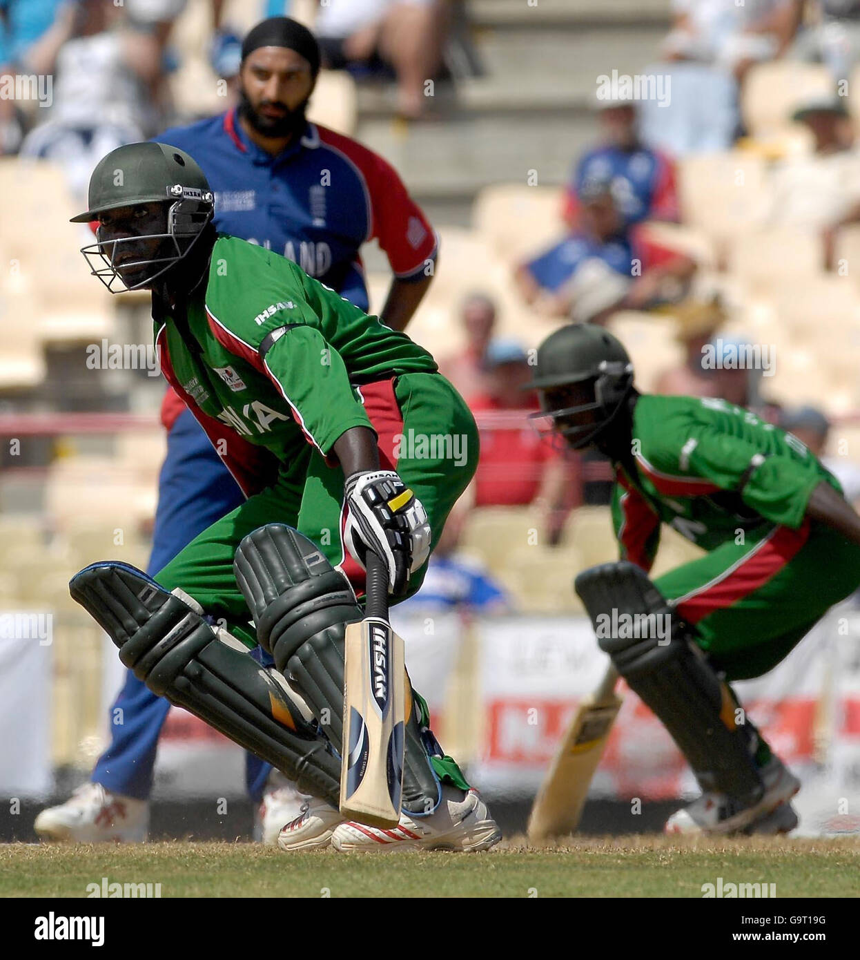 Kenya's Steve Tikoli scores another run off the bowling of England's ...