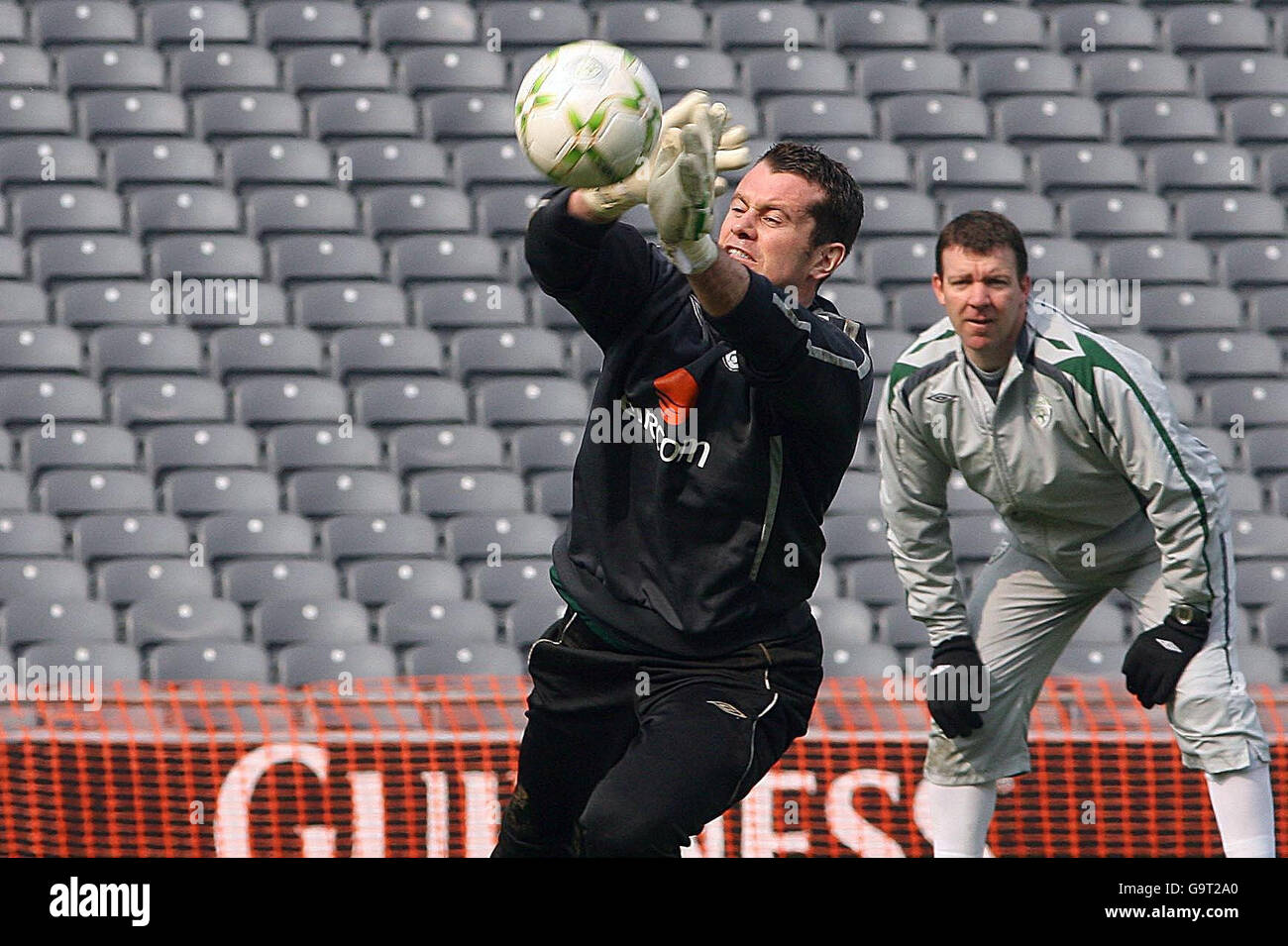 Republic of Ireland's goalkeeping coach Alan Kelly (right) watches over ...