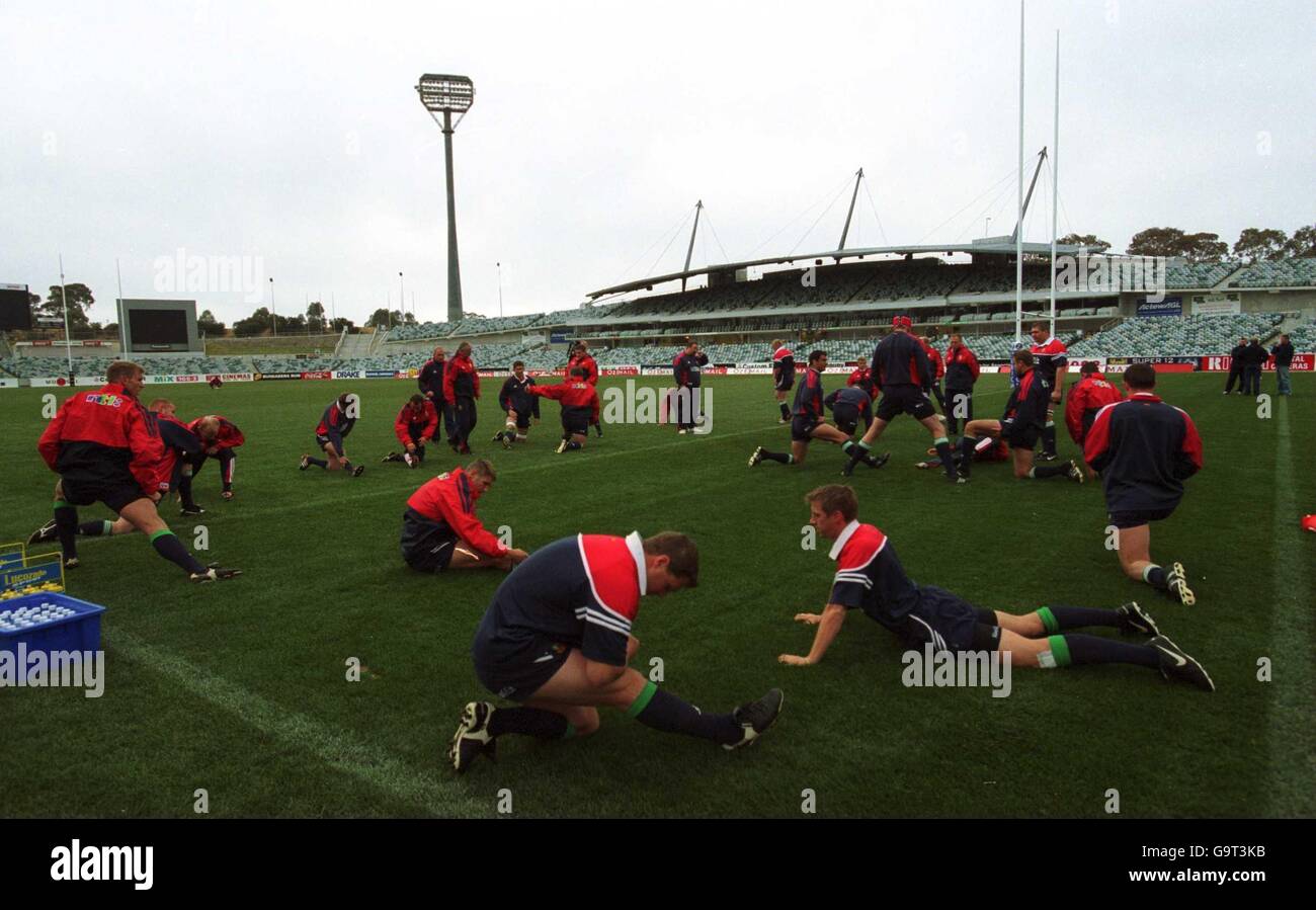 The British Lions stretch prior to training at Bruce Stadium for their ...