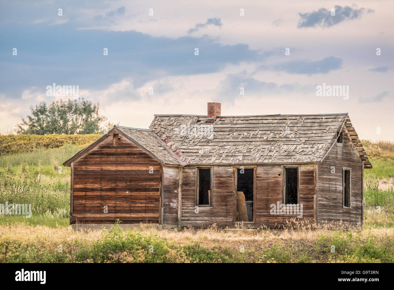 old abandoned farmhouse on a prairie, St Vrain State Park near Longmont ...