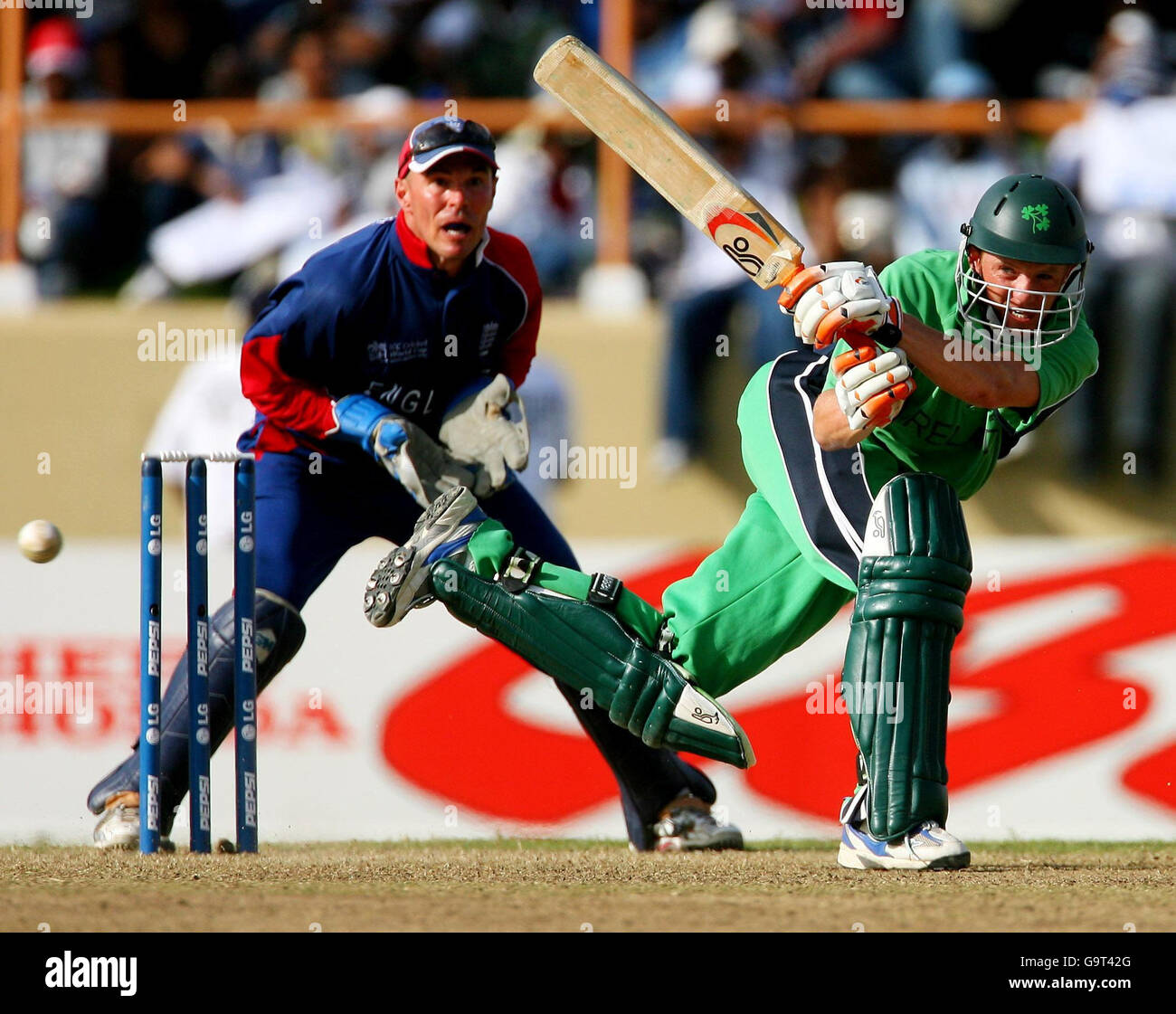 Ireland's Niall O'Brien in action watched by England wicketkeeper Paul ...