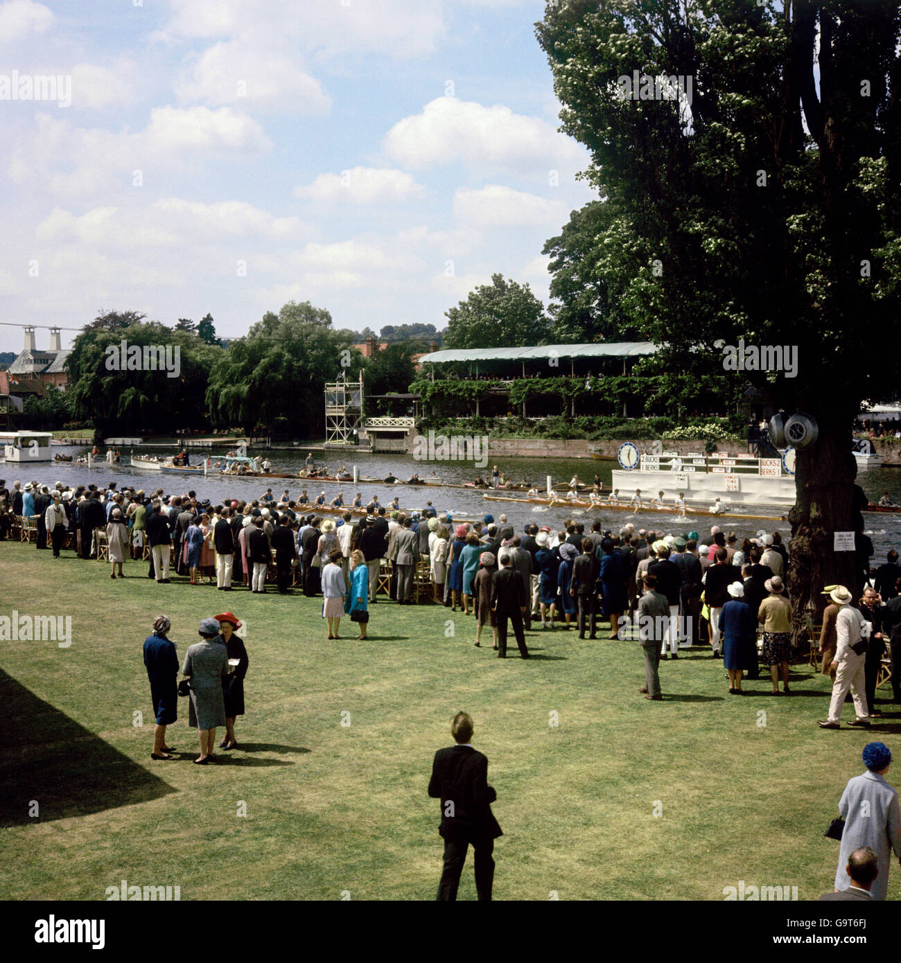 Green lawns, a calm River Thames and the fashionable crowd at Henley ...