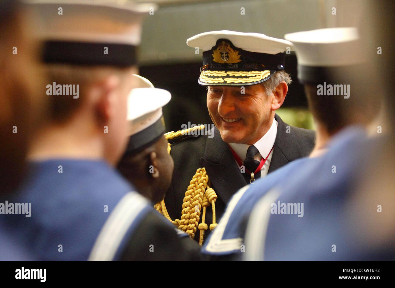The First Sea Lord, Admiral Sir Jonathon Band speaks to members of the ...