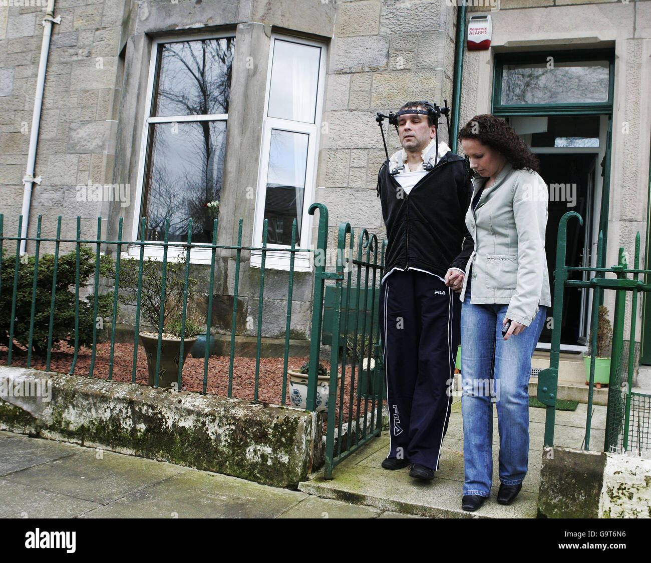 Hero train driver Iain Black is helped along the path of his Dumbarton ...