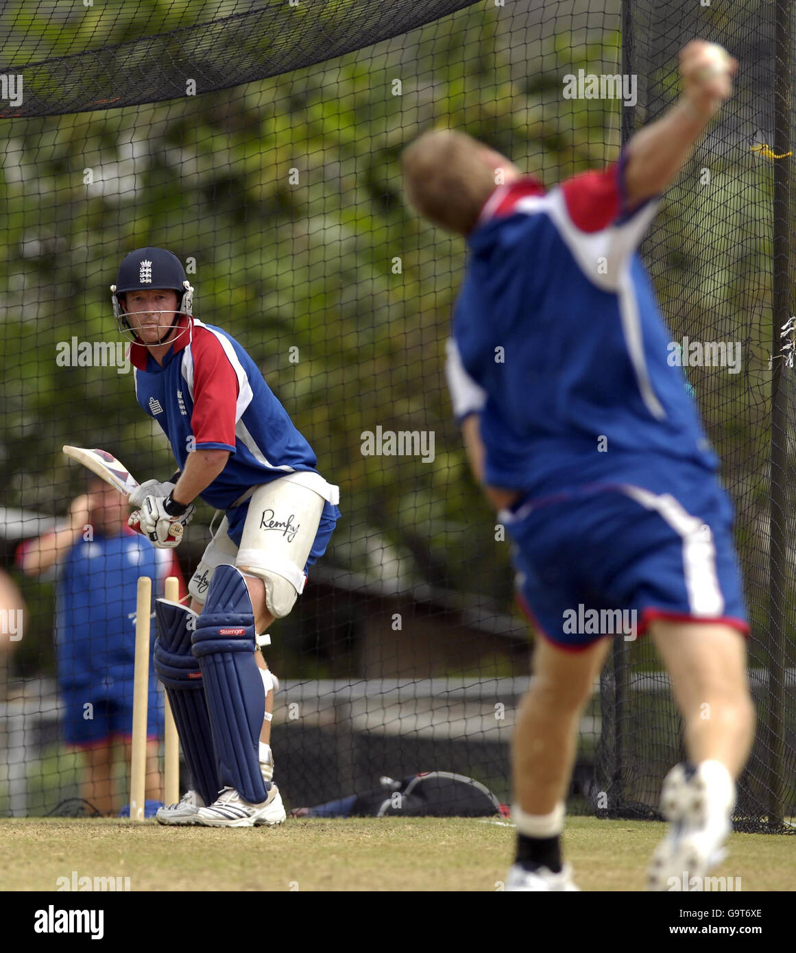 England's Andrew Flintoff bowls at team-mate Paul Collingwood during a ...