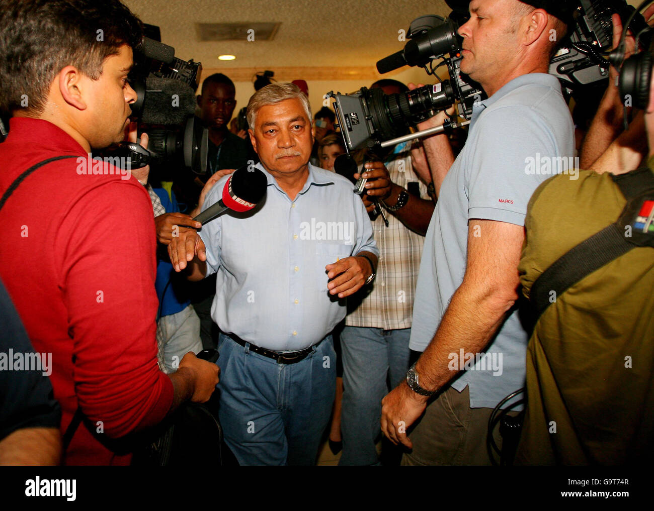 Pakistan cricket team manager Talat Ali is surrounded by media as the ...