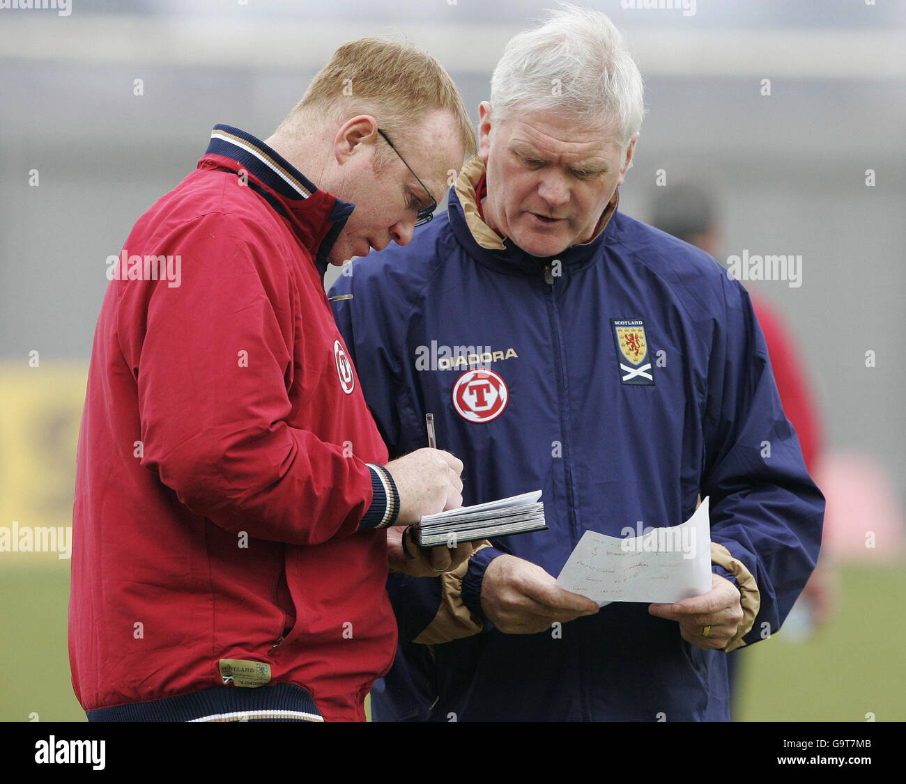 Scotland assistant coach Roy Aitken with manager Alex McLeish during a ...