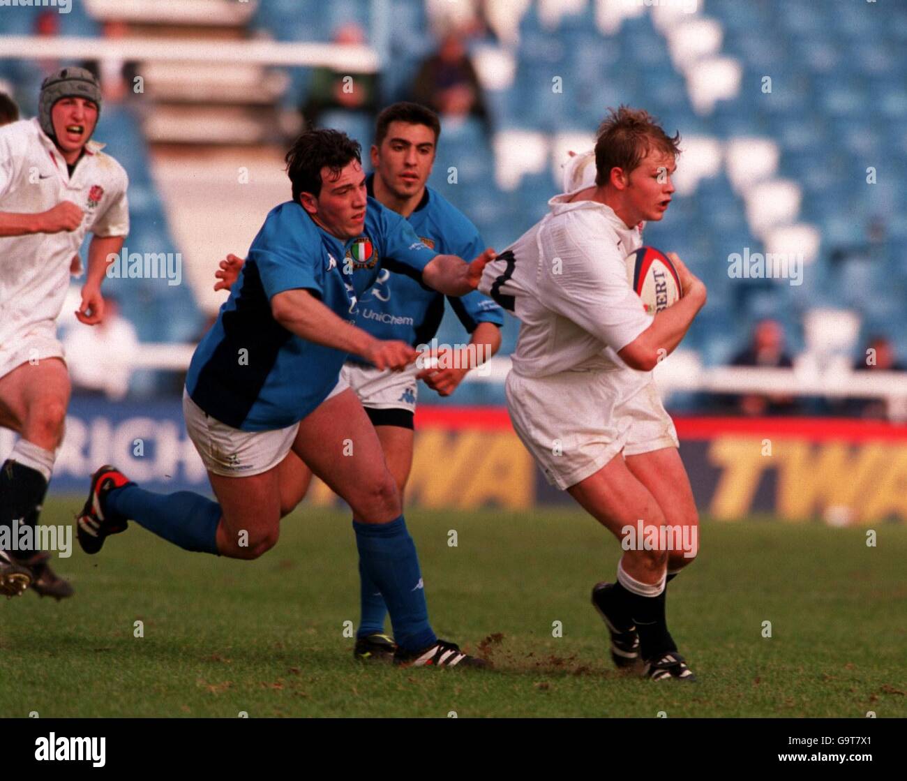 Englands mark tucker r is pulled back by his shirt hi-res stock ...