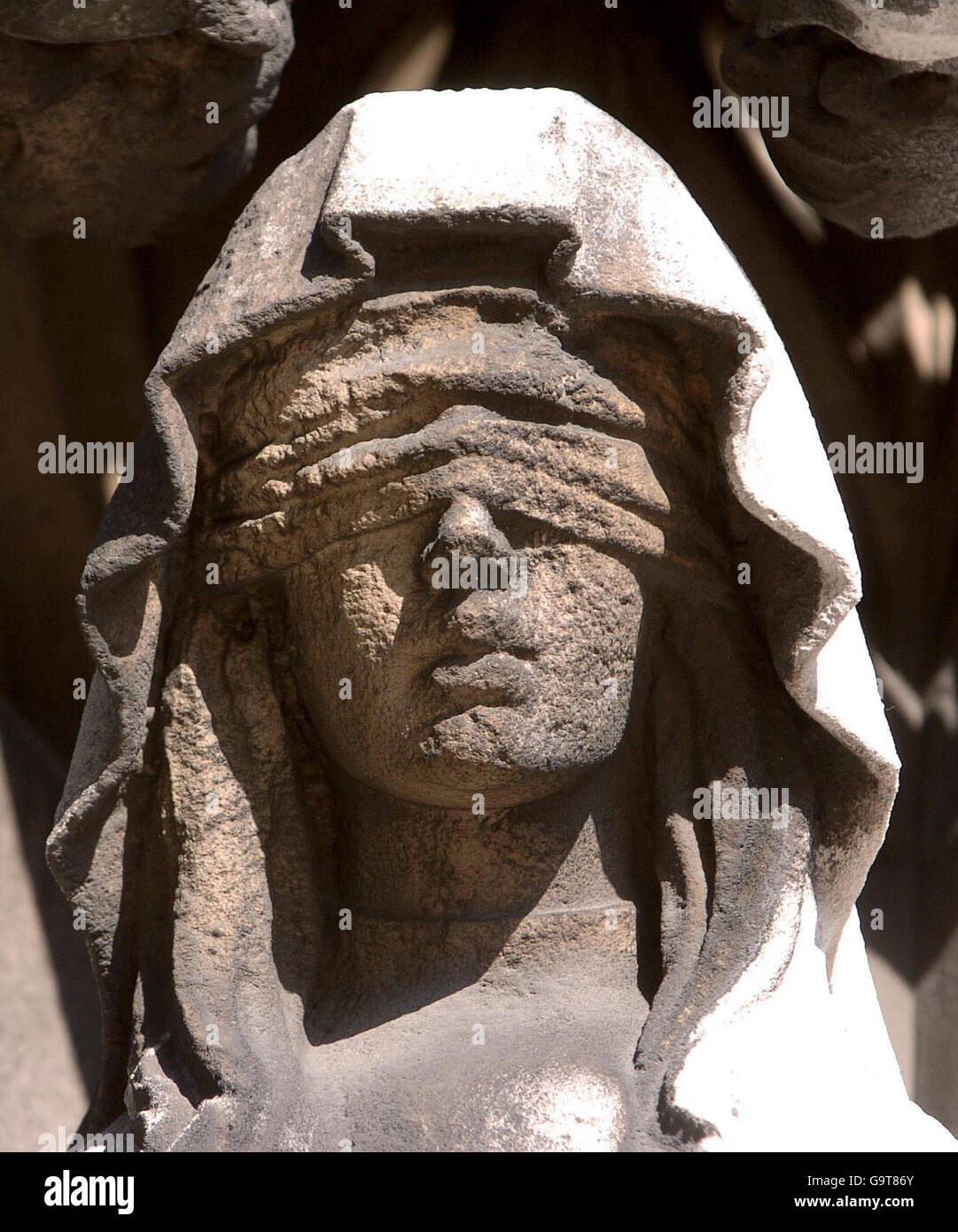 Statue featuring over the rear door of Middlesex Guildhall, in ...