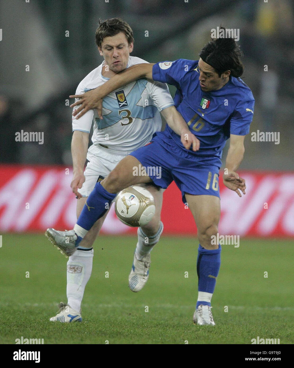 Scotland's Gary Naysmith challenges Italy's Mauro german Camoranesi ...