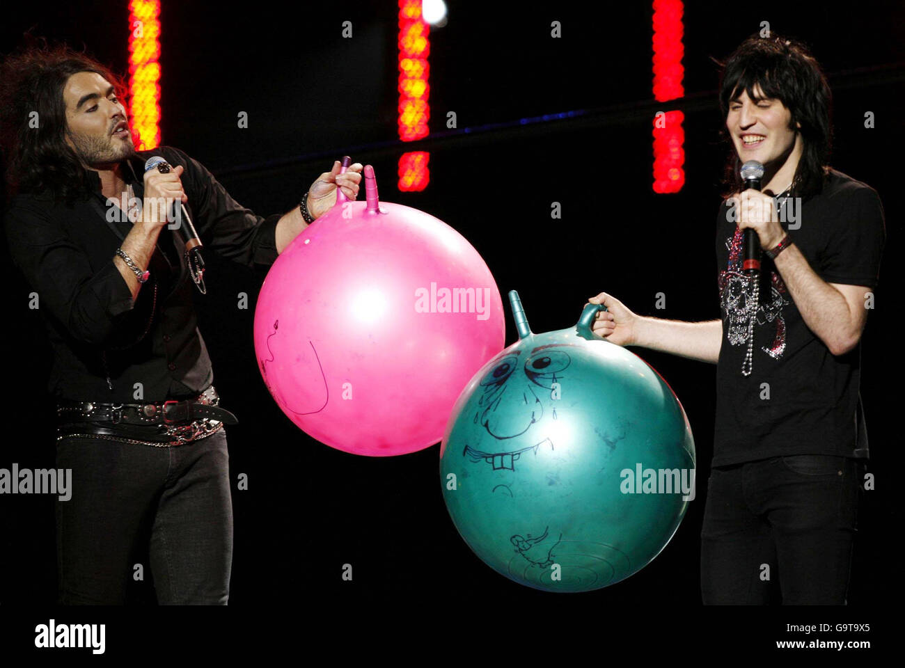 Russell Brand and Noel Fielding performing during the eenage Cancer ...