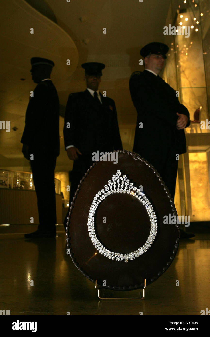 Harrods security guards watch over a 40cm Belgian dark chocolate half ...