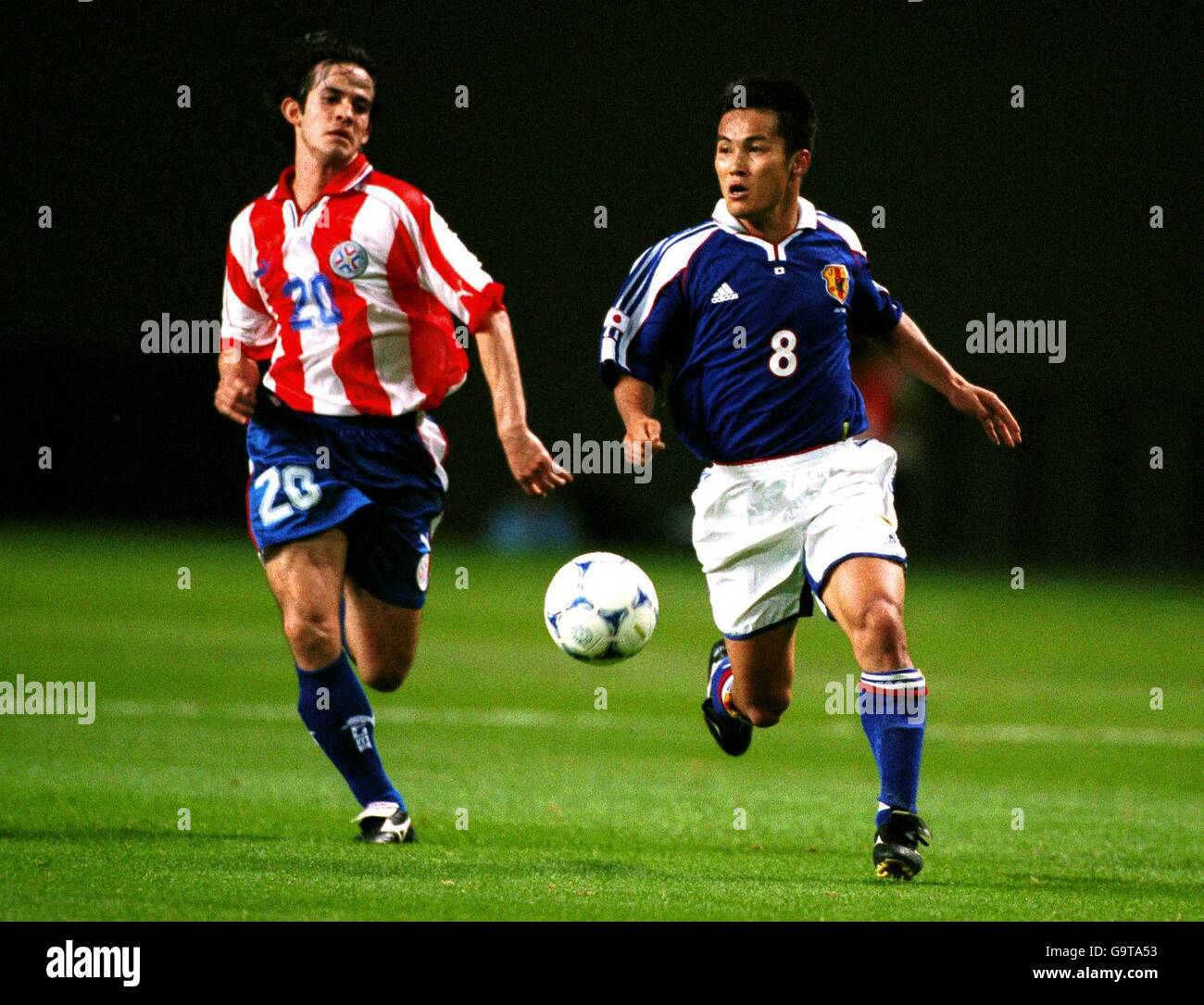 Diego gavilan of paraguay chases hiroaki morishima of japan hi-res ...