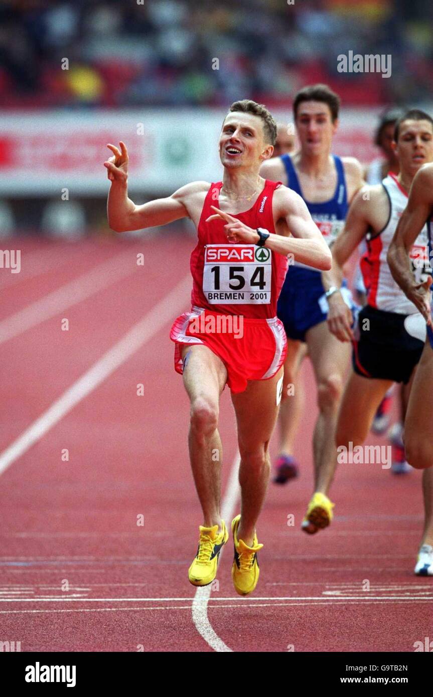 Poland's Pawel Czapiewski celebrates as he crosses the line to win the ...