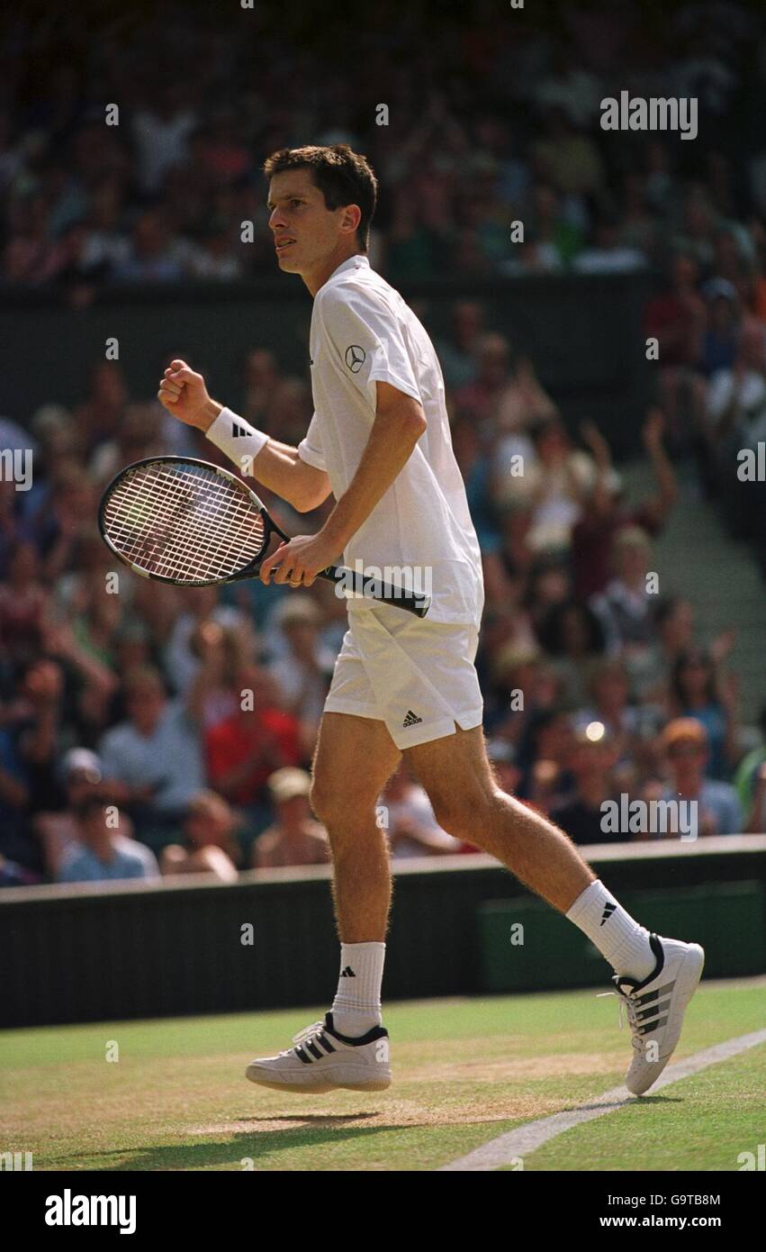 Tennis - Wimbledon Championships - Third Round. Tim Henman celebrates ...