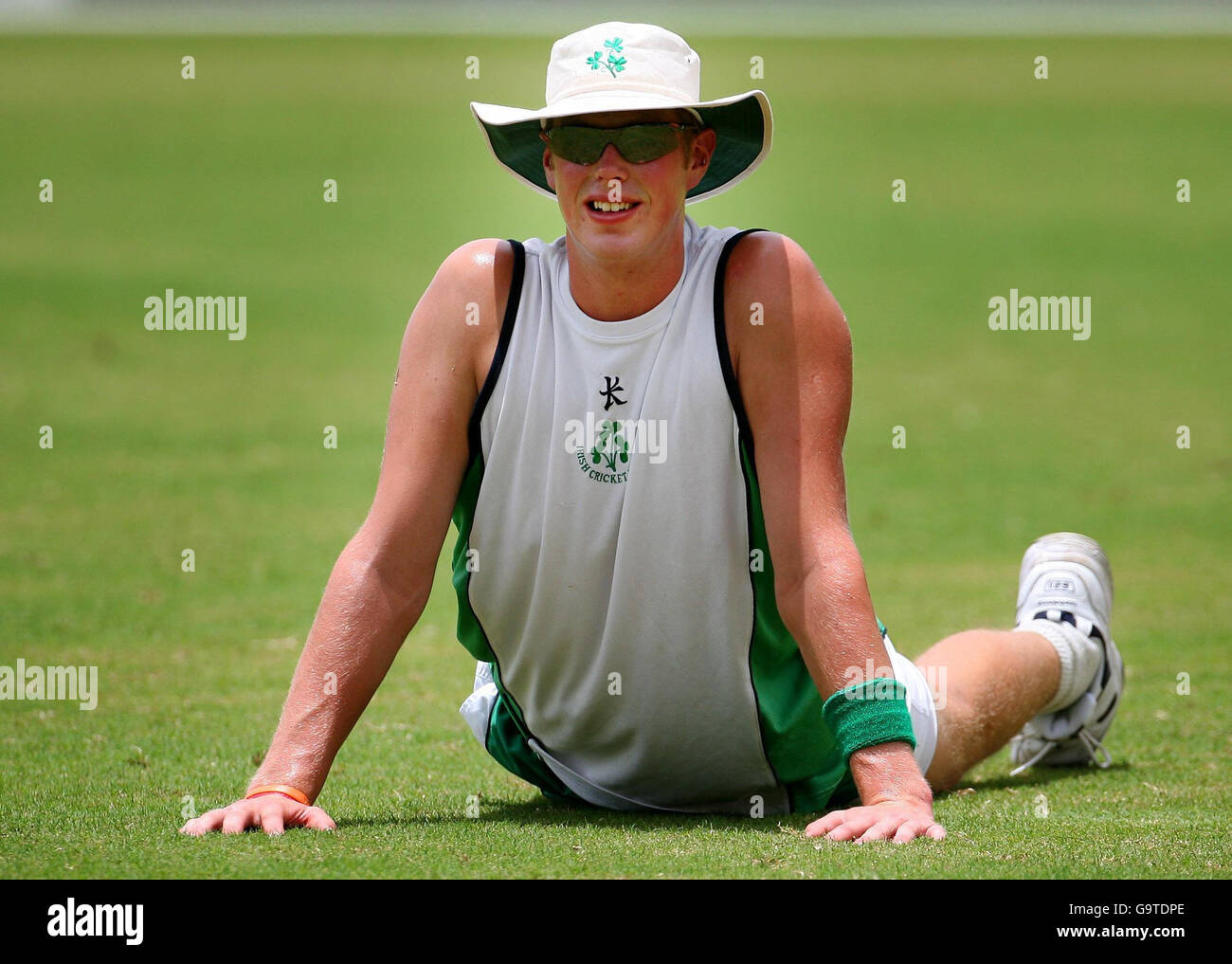 Irish bowler Boyd Rankin stretches during a training session at the ...